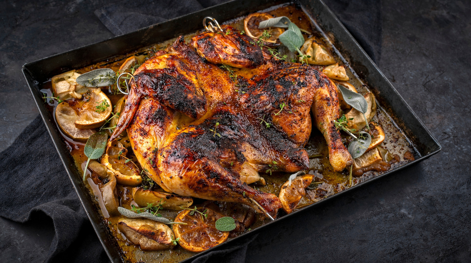 Flatten Out Your Butterflied Poultry On The Grill With One Extra Tool