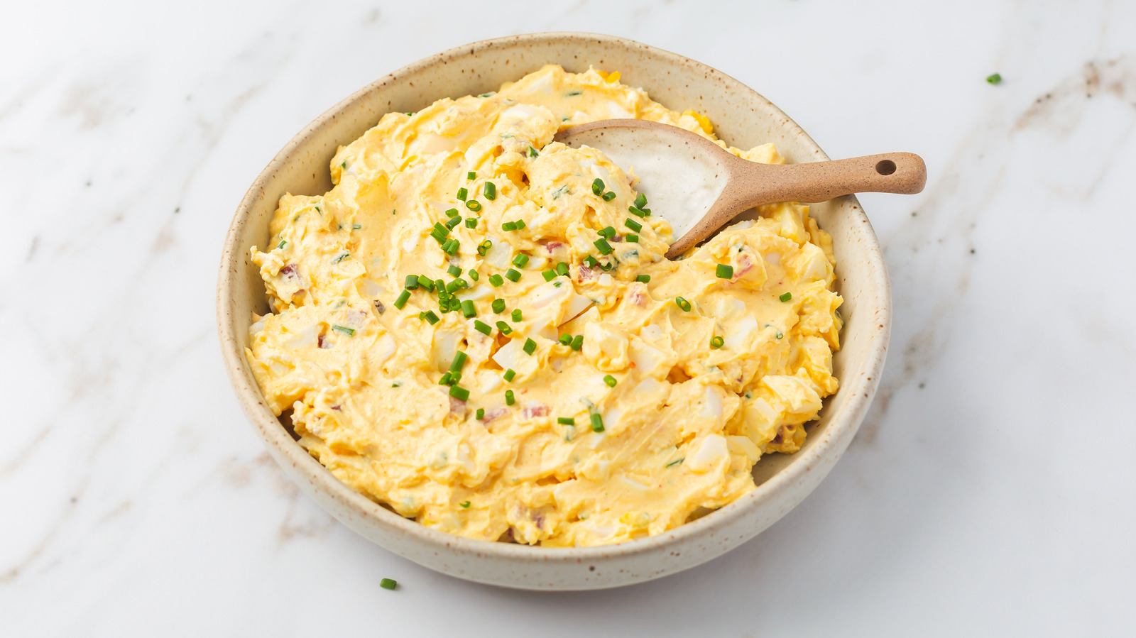 The Decadent Spread That Makes The Creamiest Egg Salad Possible