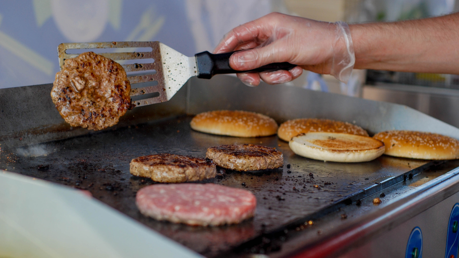 Why Flipping Your Burger More Than Once Is A Big Mistake