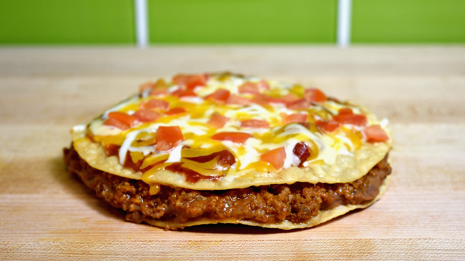 The Taco Bell Swap That Gives Your Mexican Pizza A Nacho Makeover