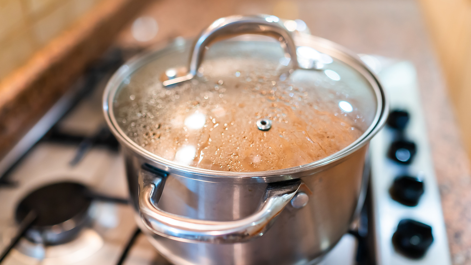 How To Get A Vacuum Sealed Lid Off A Boiling Pot