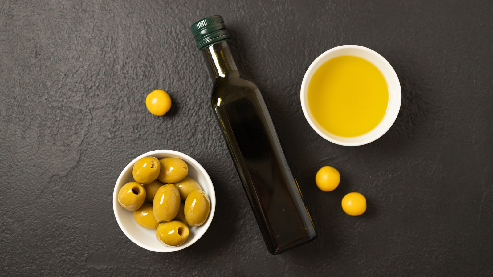 You Should Definitely Be Adding Olive Pits To Your Olive Oil Bottles ...